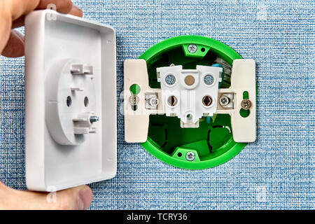 Loose electrical wall socket outlet Stock Photo - Alamy