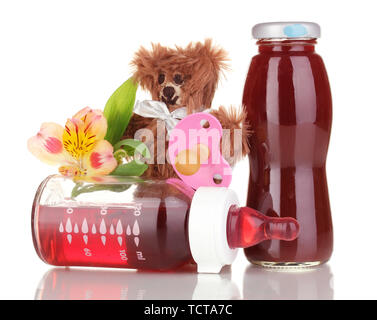 Baby bottle with fresh juice and teddy bear on blue background Stock ...