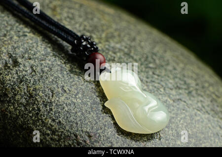 Fox jade pendant Stock Photo - Alamy