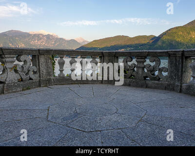 Image of Italian stone balustrade illuminated by sun rays and water in ...