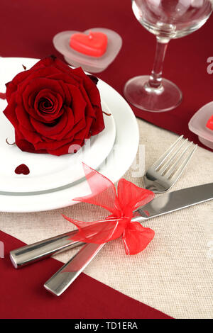 Table setting in honor of Valentine's Day close-up Stock Photo - Alamy