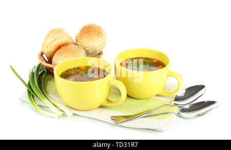 Fragrant soup in cups isolated on white Stock Photo - Alamy