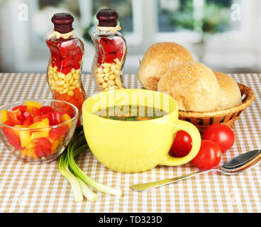 Fragrant soup in cup on table in garden Stock Photo - Alamy