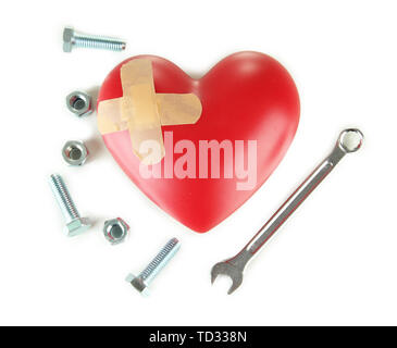 Heart and tools. Concept: Renovation of heart. Isolated on white Stock ...