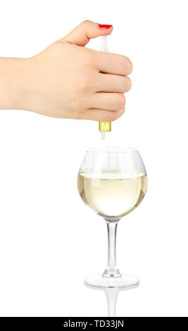 Pour something into glass with drink isolated on white Stock Photo - Alamy