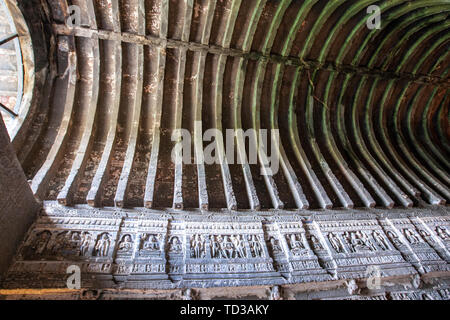 Pillars, brackets and the triforium are extensively carved with ...