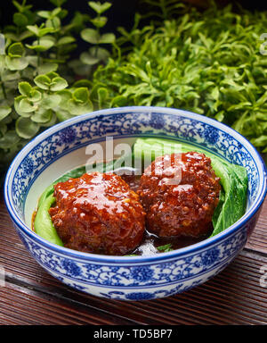 Traditional cuisine braised lion's head Stock Photo - Alamy