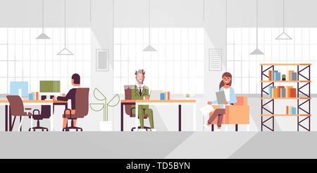 businesspeople working in creative co-working center freelancers using ...