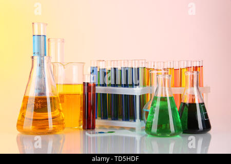 Colorful test tubes on light background Stock Photo - Alamy