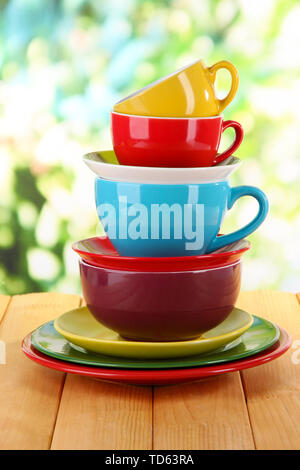 Mountain colorful dishes on nature background Stock Photo - Alamy