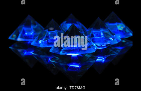 Diamonds on dark color background Stock Photo - Alamy
