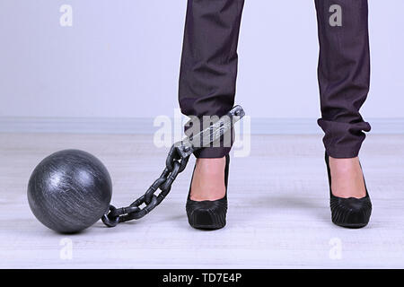 Woman shackled to ball and chain Stock Photo - Alamy