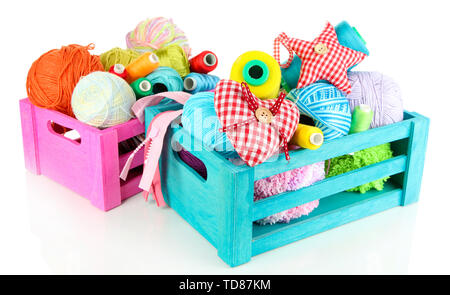 Wooden boxes with thread and sewing accessories isolated on white Stock ...