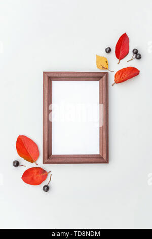 Autumn floral composition. Photo frame, colorful leaves on white ...