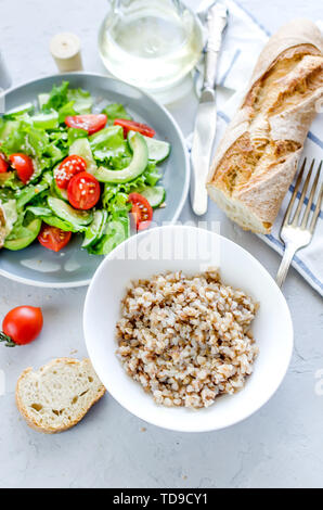 hot Buckwheat porridge with melting butter in plate andHealthy ...