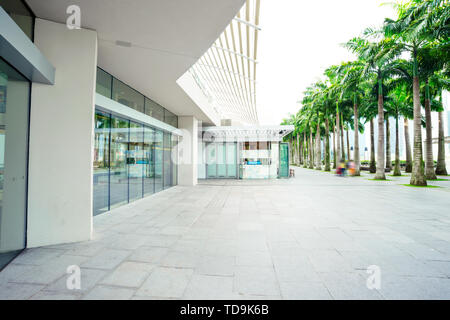 empty footpath front of modern building in blue sky Stock Photo - Alamy