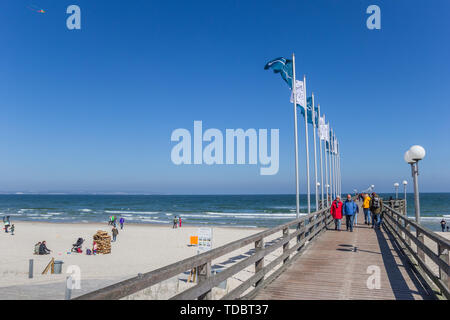 People walking the Seebrucke sea bridge in Binz on Rugen island ...