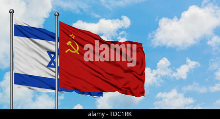 Soviet Union and Israel flag waving in the wind against white cloudy ...