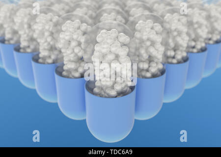 Blue granular capsule, 3-D rendering Stock Photo - Alamy