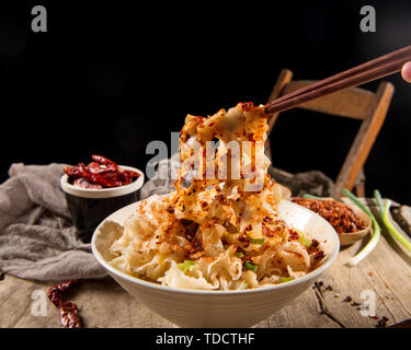 Oil poured noodles pasta noodles Shaanxi oil splash chili Stock Photo ...