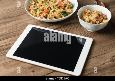 Egg fried rice with computer screen Stock Photo - Alamy