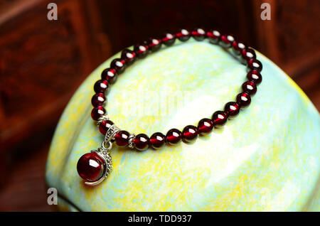 Garnet hand bracelet Stock Photo - Alamy