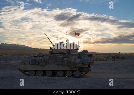 An M1150 Assault Breacher Vehicle that launches a mine clearing line ...