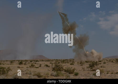 An M1150 Assault Breacher Vehicle that launches a mine clearing line ...