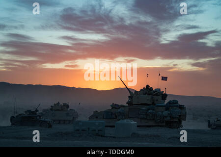 An M1150 Assault Breacher Vehicle that launches a mine clearing line ...