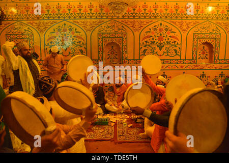Ajmer, India. 15th June, 2019. Devotees playing different instruments ...