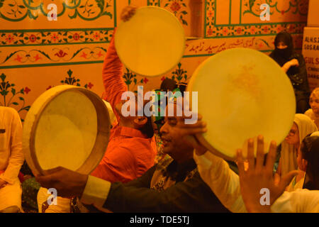 Ajmer, India. 15th June, 2019. Devotees playing different instruments ...