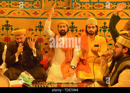 Ajmer, India. 14th June, 2019. Devotees playing different instruments ...