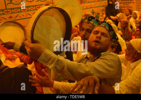 Ajmer, India. 15th June, 2019. Devotees playing different instruments ...