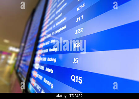 Flight display screen board in airport Stock Photo - Alamy