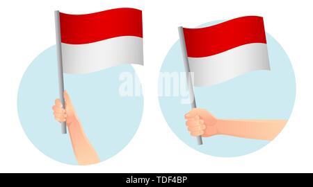 Monaco flag in hand. Patriotic background. National flag of Monaco ...