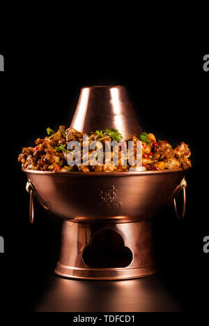 Carbon fire bullfrog pot Stock Photo - Alamy
