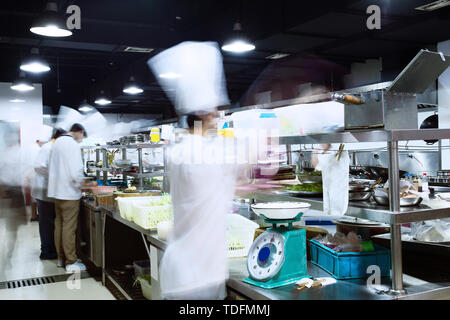 Modern and busy chefs Stock Photo - Alamy