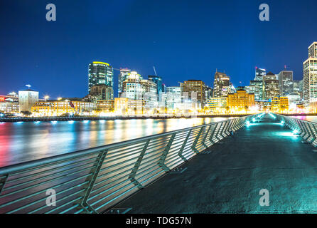 empty footpath over water to modern office buildings in san francisco ...