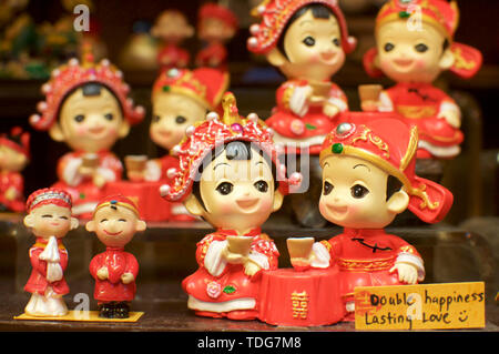 Traditional chinese miniature figurines in a souvenir shop. Shanghai ...