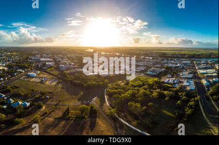 Aerial view of Bundaberg city and the Burnett River, with farmland ...