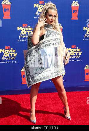 Tana Mongeau arrives at the MTV Movie and TV Awards on Saturday, June ...