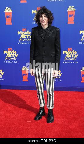 Finn Wolfhard attends the 2019 MTV Movie and TV Awards at Barker Hangar ...