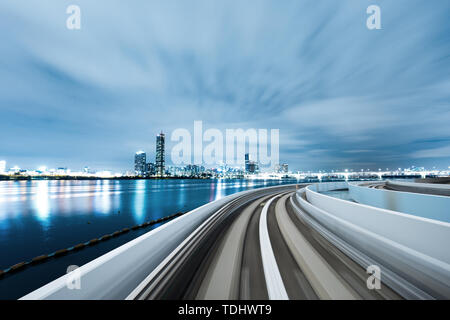Empty road with cityscape and skyline Stock Photo - Alamy