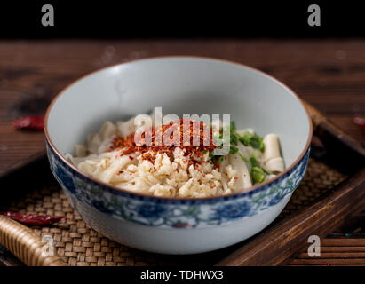 oil spill noodle Stock Photo - Alamy