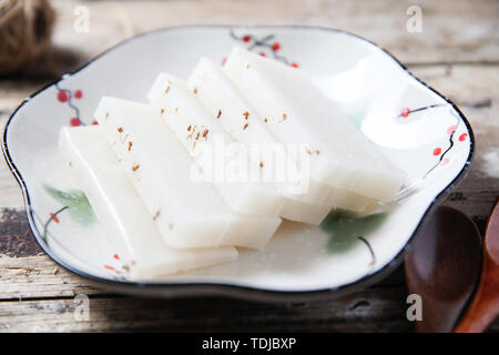 New Year's Eve dinner osmanthus sugar rice cake Stock Photo - Alamy