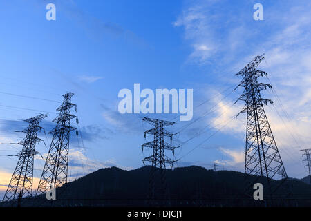 Pylon on hill in bluesky Stock Photo - Alamy