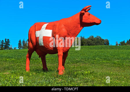 Red Swiss cow statue Stock Photo - Alamy
