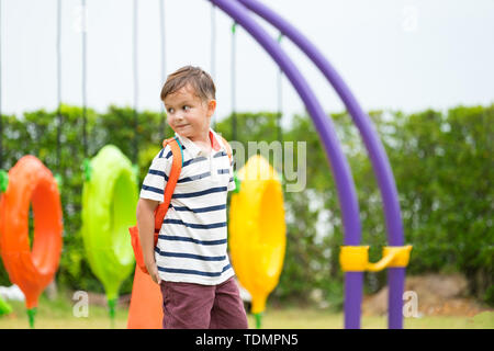 Elementary school kids having fun outdoors Stock Photo - Alamy