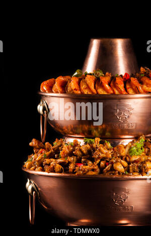 Carbon fire bullfrog pot Stock Photo - Alamy