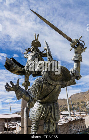 Statue of Inca warrior fighting a Spanish conquistador in Maca, Colca ...